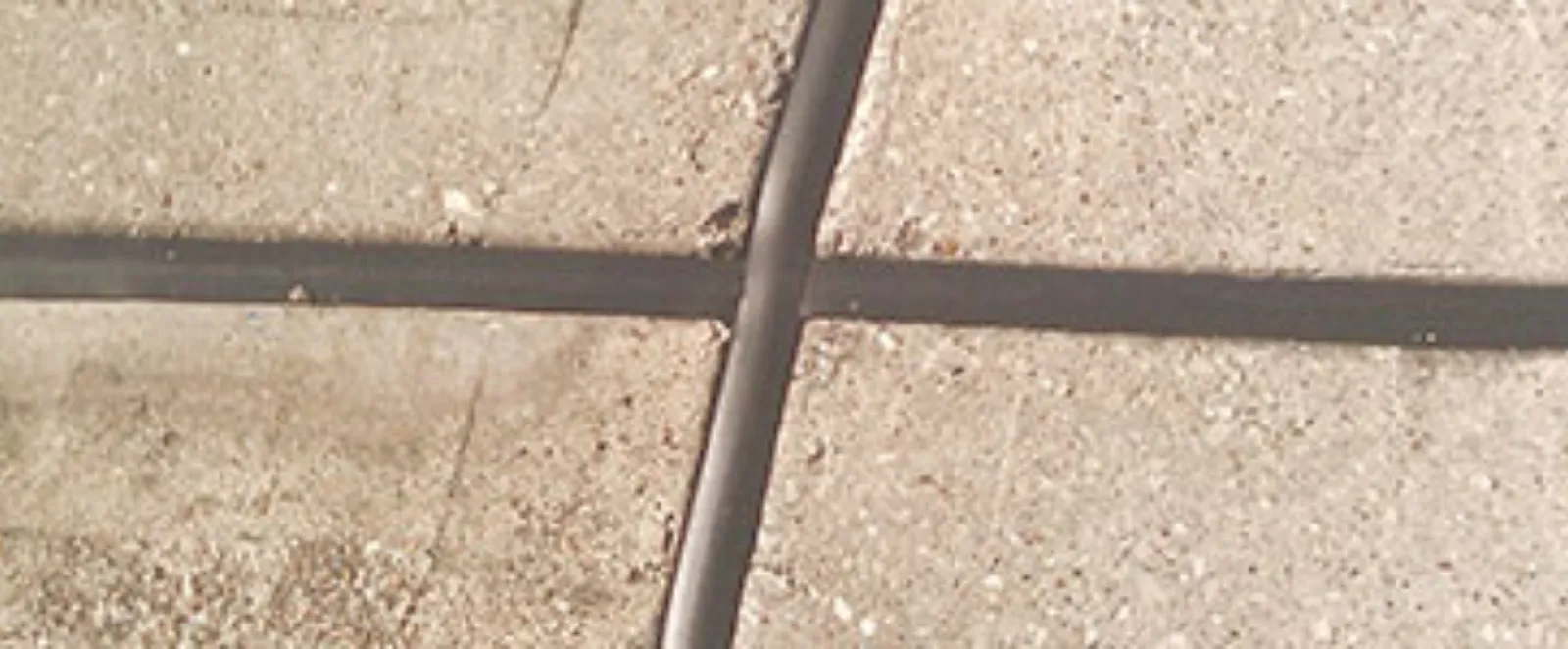 Should You Caulk Water Joints in Driveway Concrete